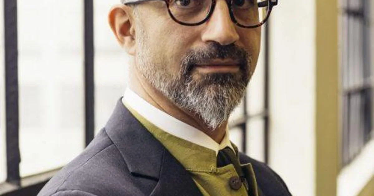 John E. Fernández — ADE